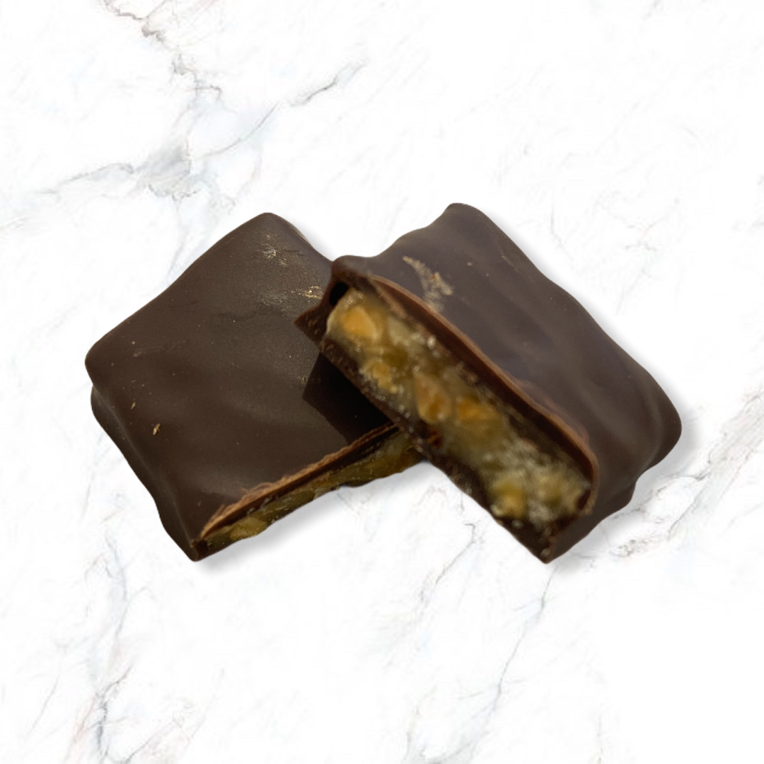 Nougatine coated with dark chocolate – La Chocolaterie Concept Chocolate